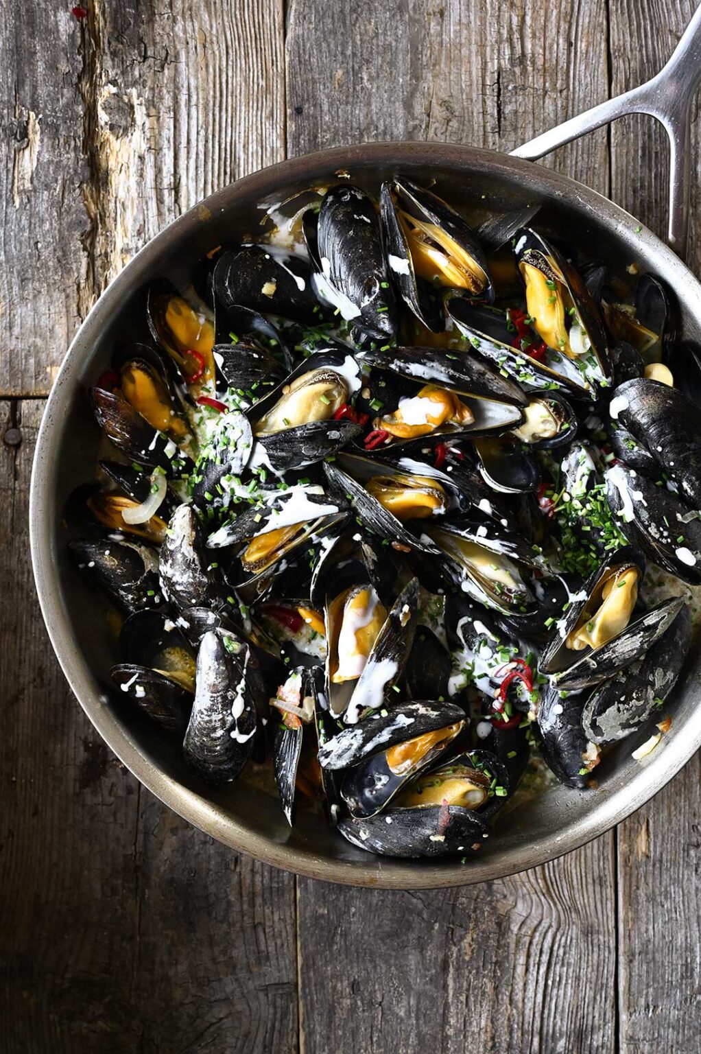 Mussels in Garlic Miso Broth - Serving Dumplings