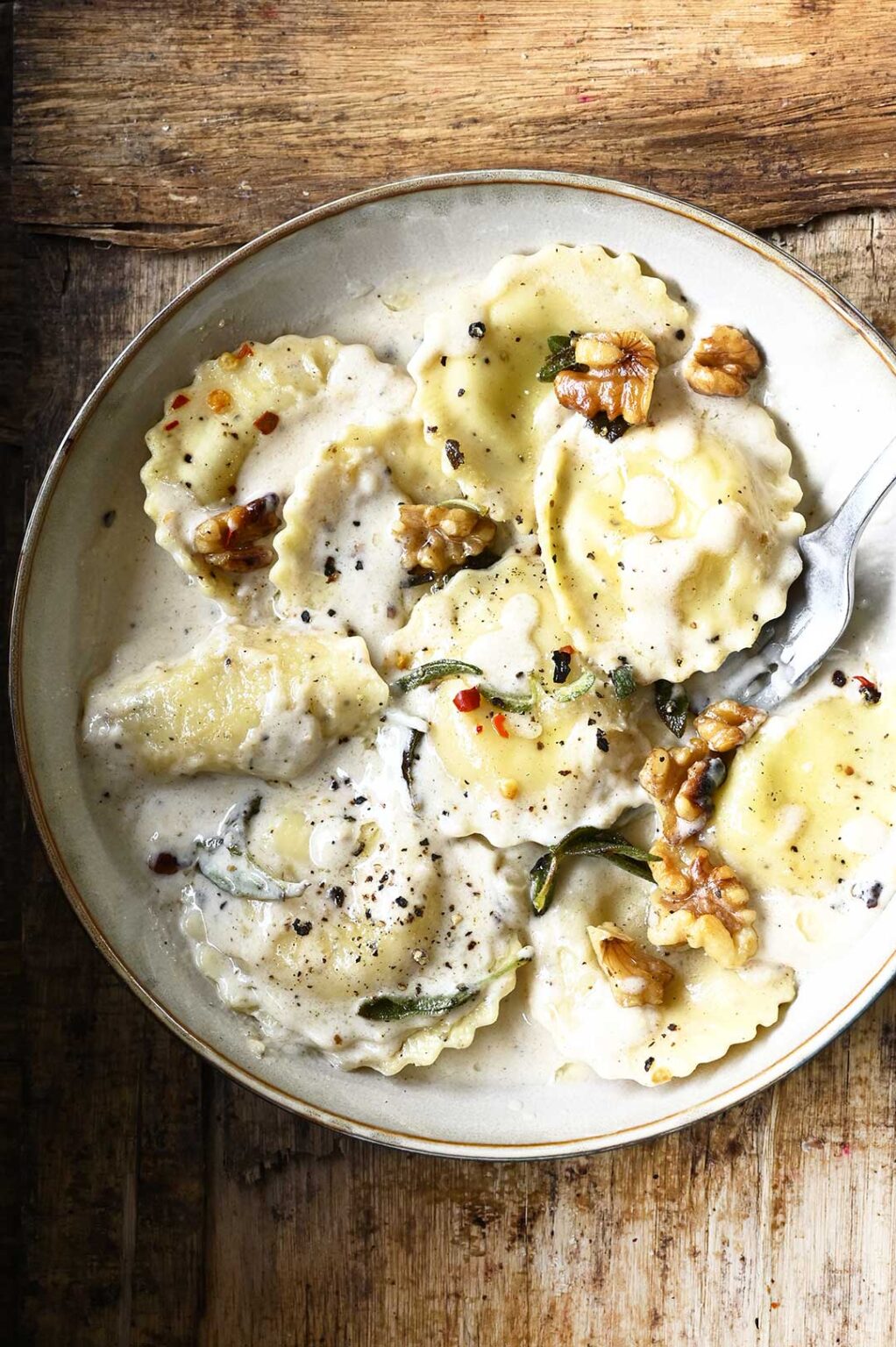 Ravioli in Creamy Parmesan Sauce - Serving Dumplings