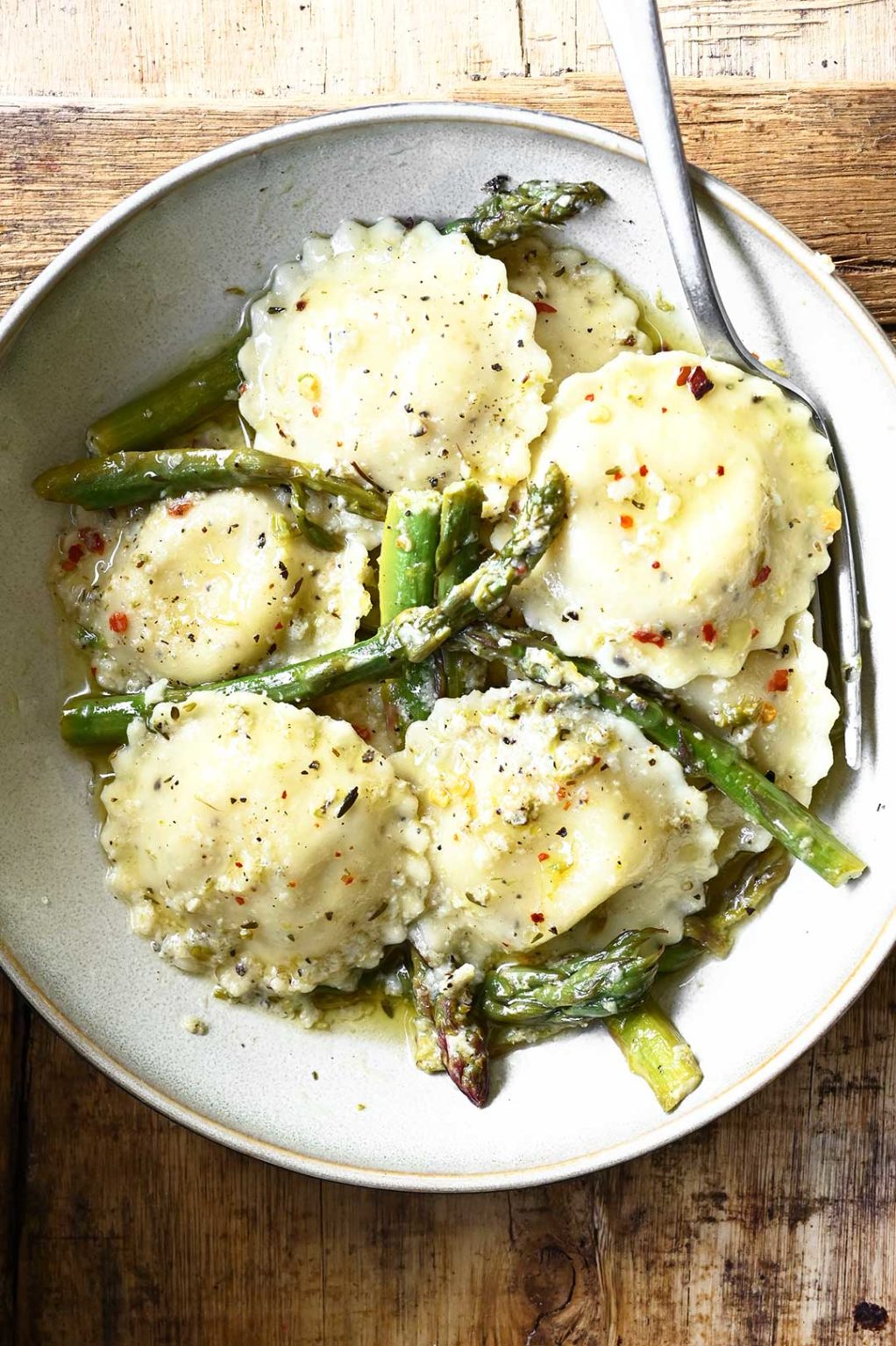 Ravioli in Lemon Parmesan Butter - Serving Dumplings
