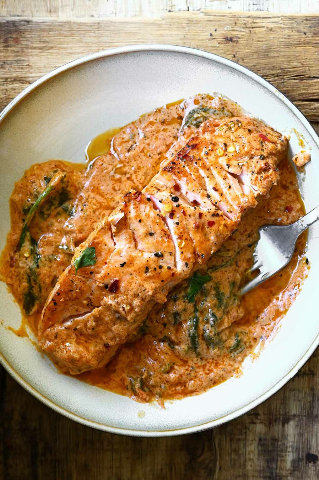 Salmon in Creamy Red Pesto Sauce - Serving Dumplings