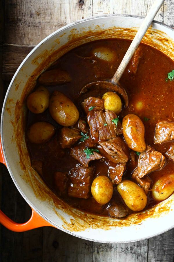 Hearty Beef and Potato Stew - Serving Dumplings
