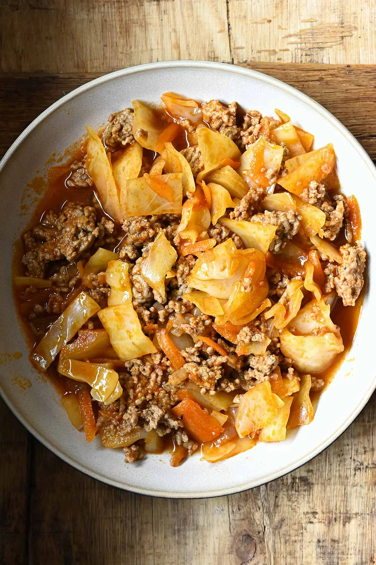 Ground Beef Cabbage Skillet - Serving Dumplings