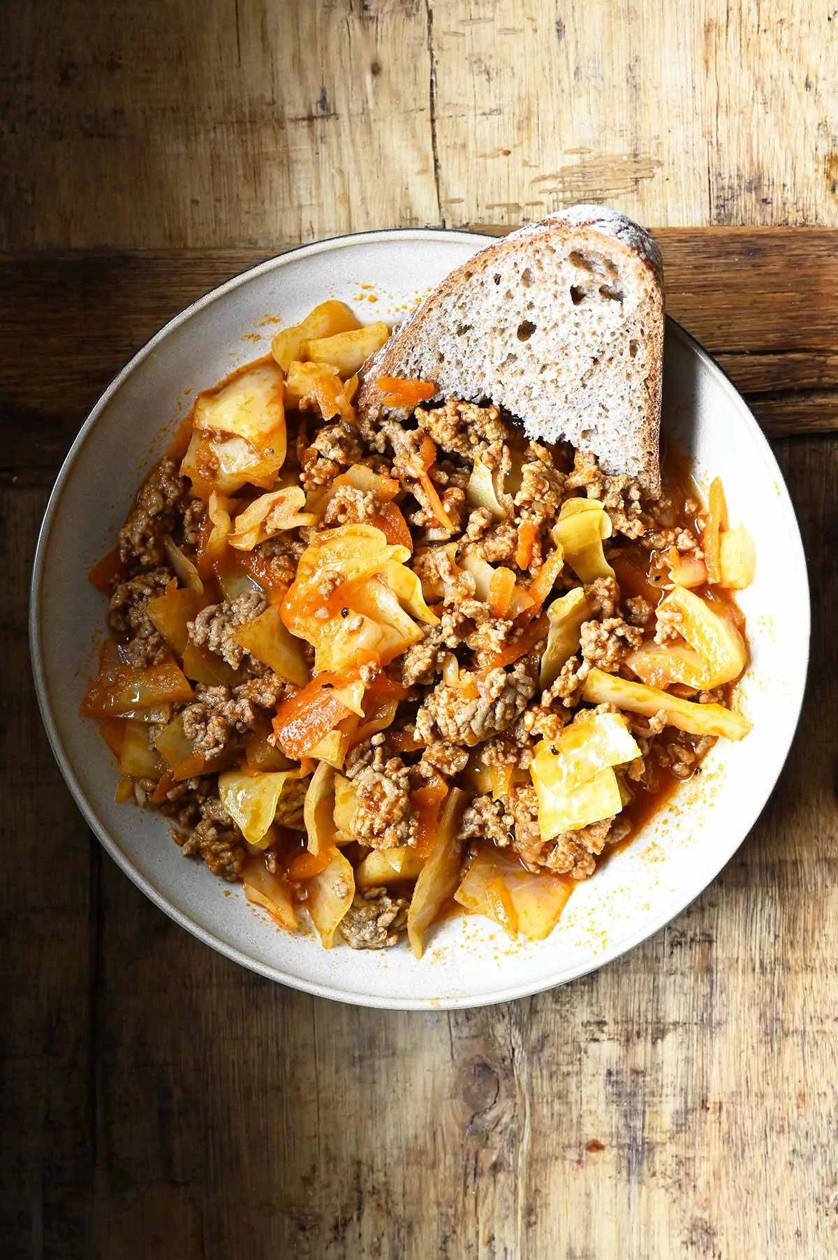 Ground Beef Cabbage Skillet - Serving Dumplings