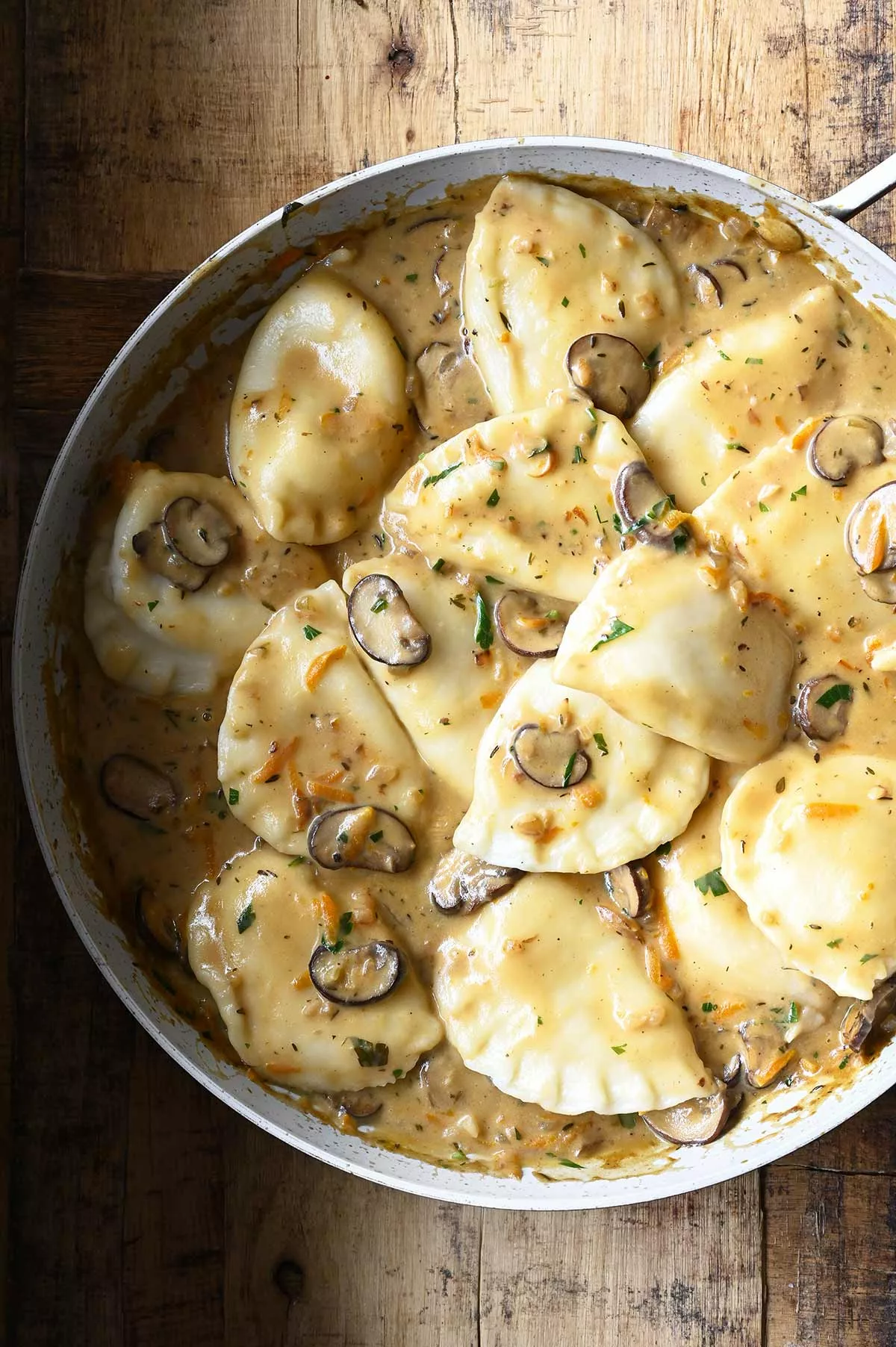Pierogi with Creamy Mushroom Sauce - Serving Dumplings